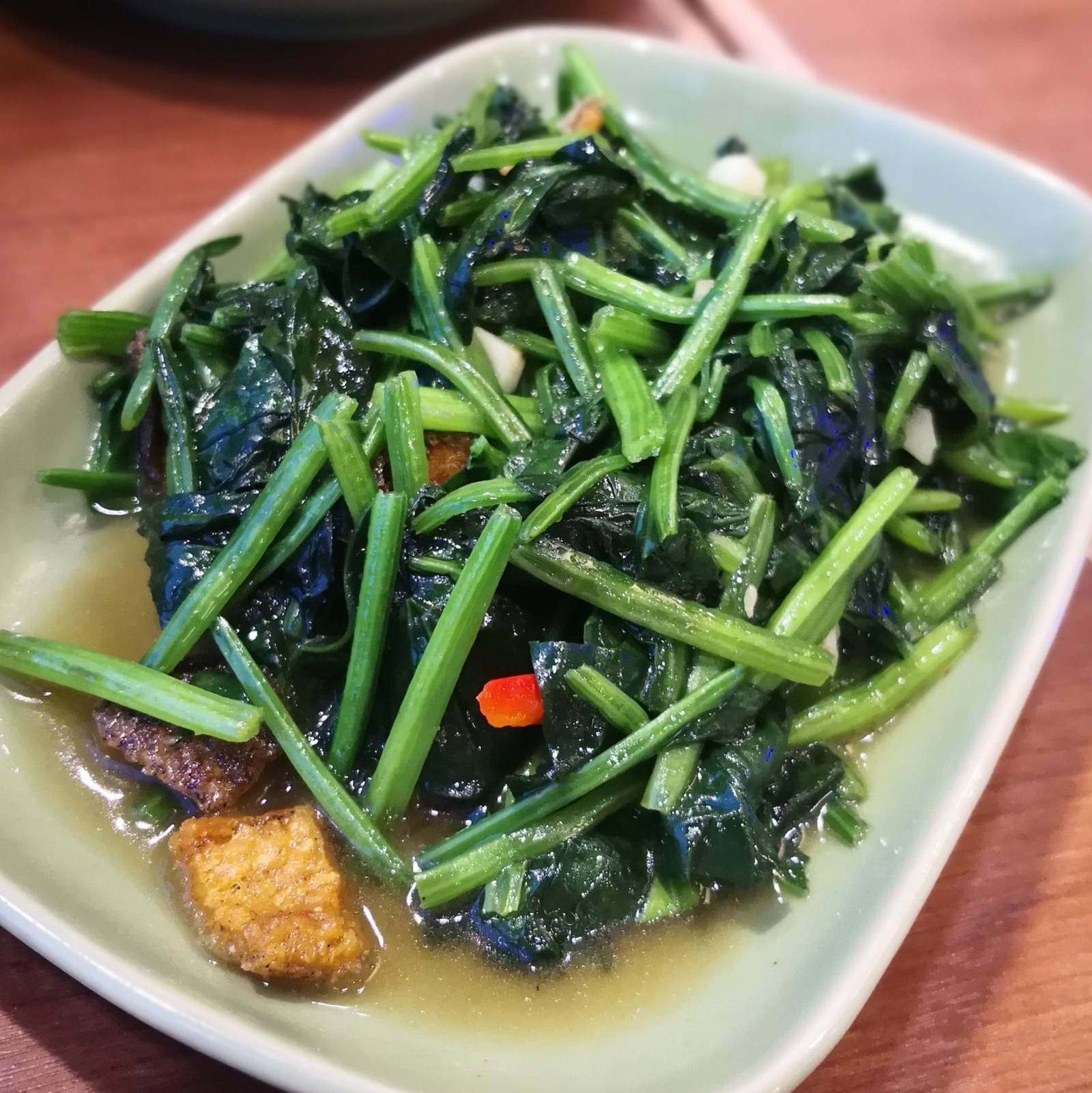 ผัดผักปวยเล้ง ร้าน Steak Lao ถนนอุดมสุข - Wongnai