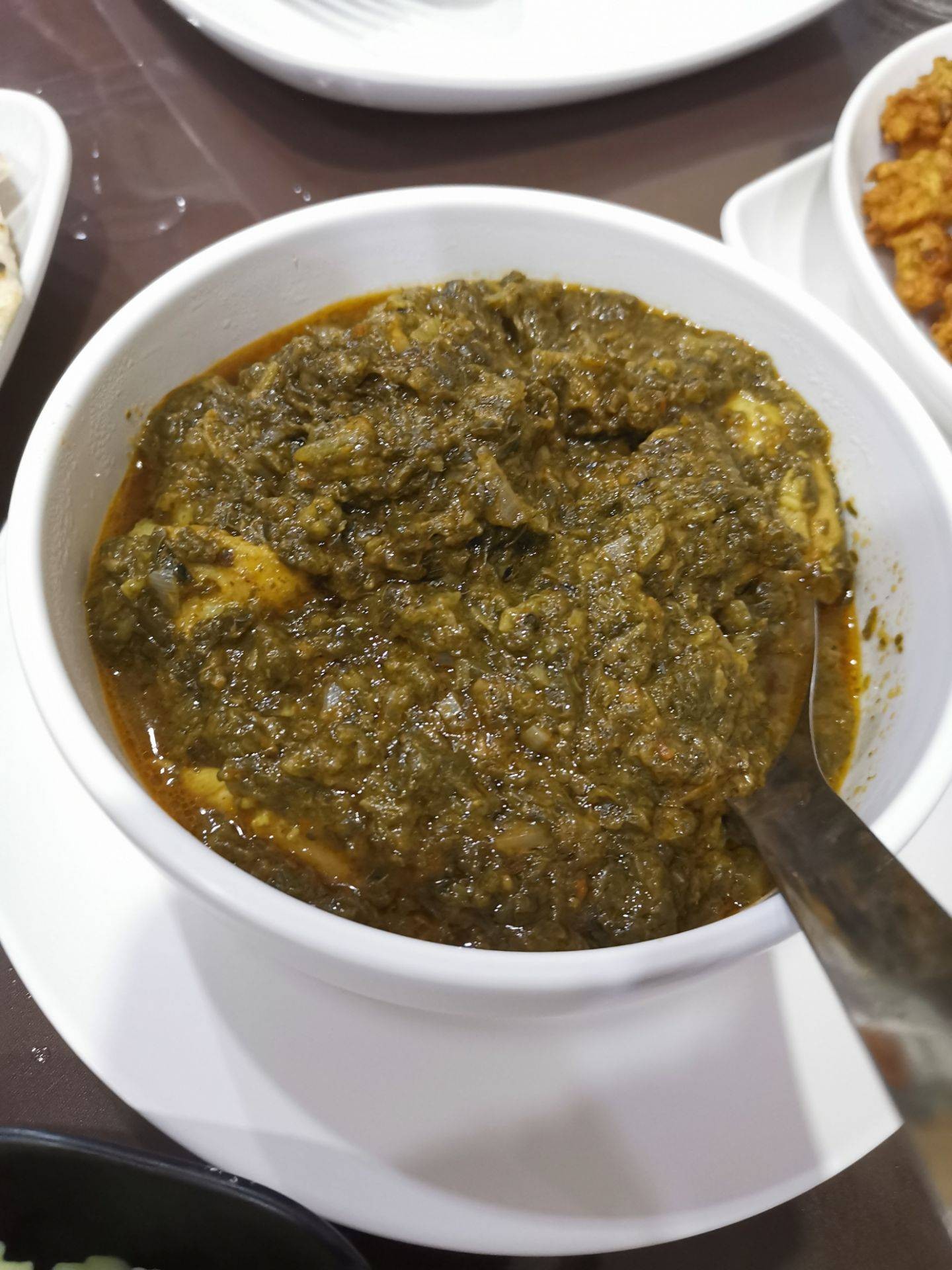 African style stir-fried amaranth with chicken (Chicken Saka saka or ...