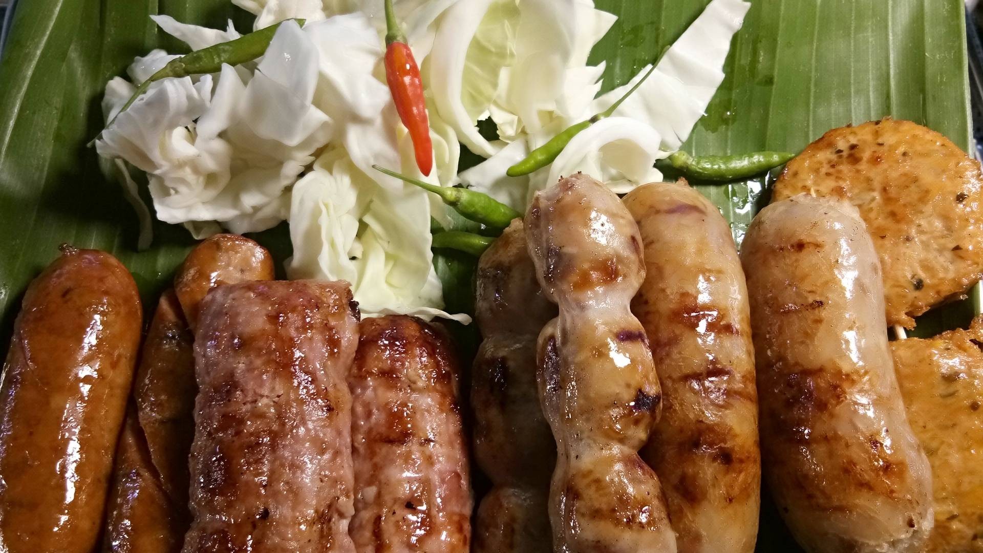 ไส้กรอกอีสาน หมึกแห้งย่าง ข้าวโพดคลุกเนย หน้าโลตัสประตูเชียงใหม่ - สั่ง ...