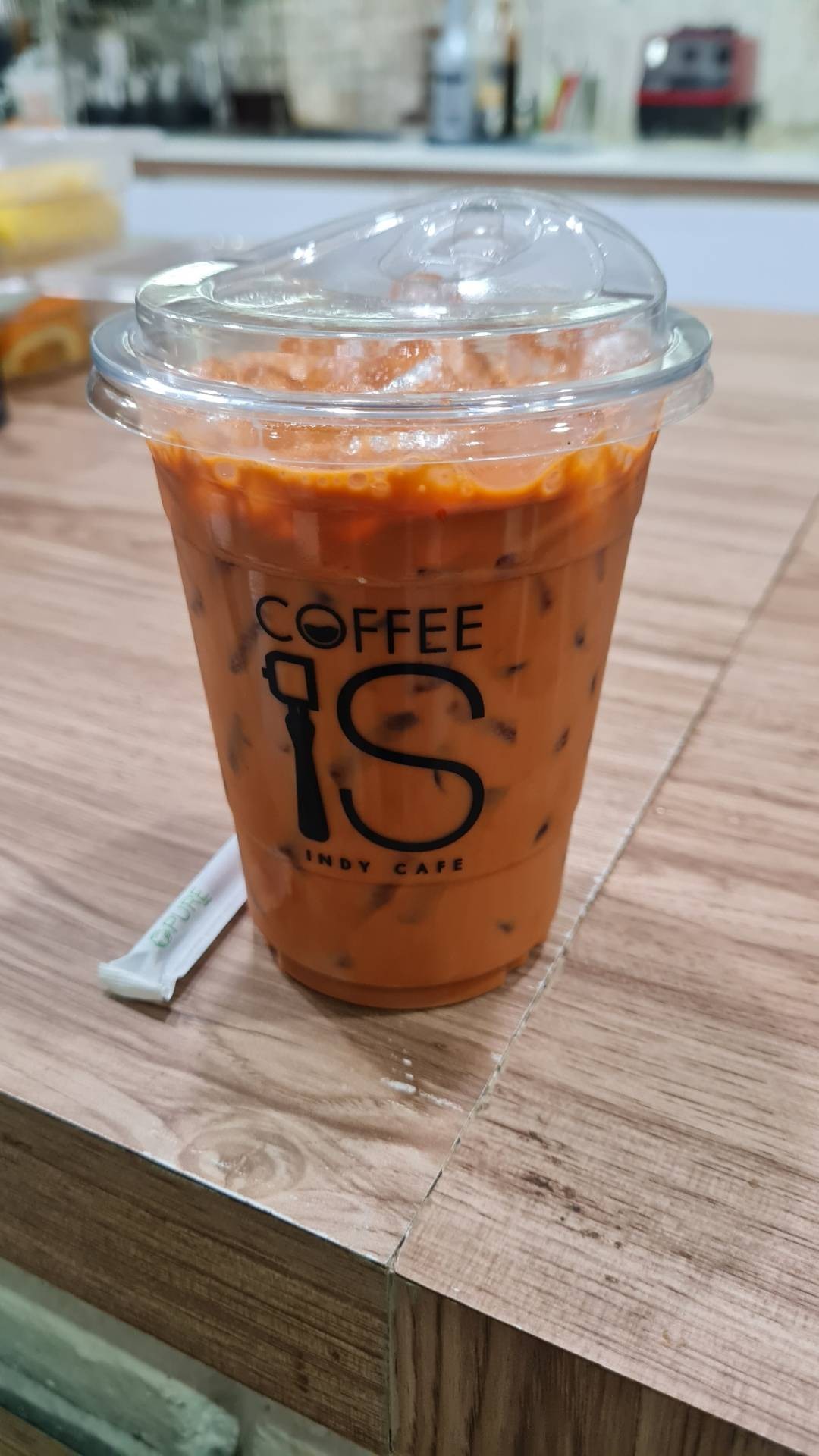 Iced Thai Tea ร้าน Coffee is : the artisan cafe Empire Tower